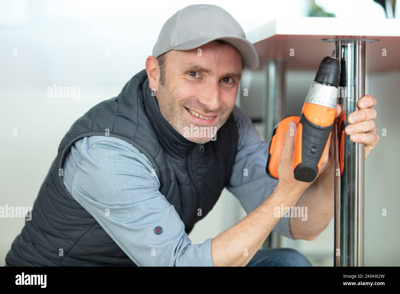 Man using electrical drill hi-res stock photography and images - Alamy