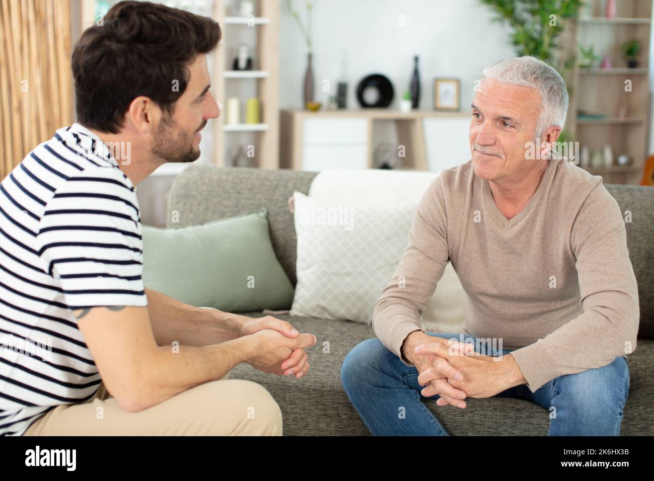 Senior man talking relatives hi-res stock photography and images - Alamy