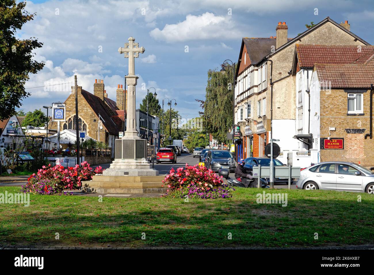 The War Memorial and the High Street at Shepperton on an sunny autumnal ...