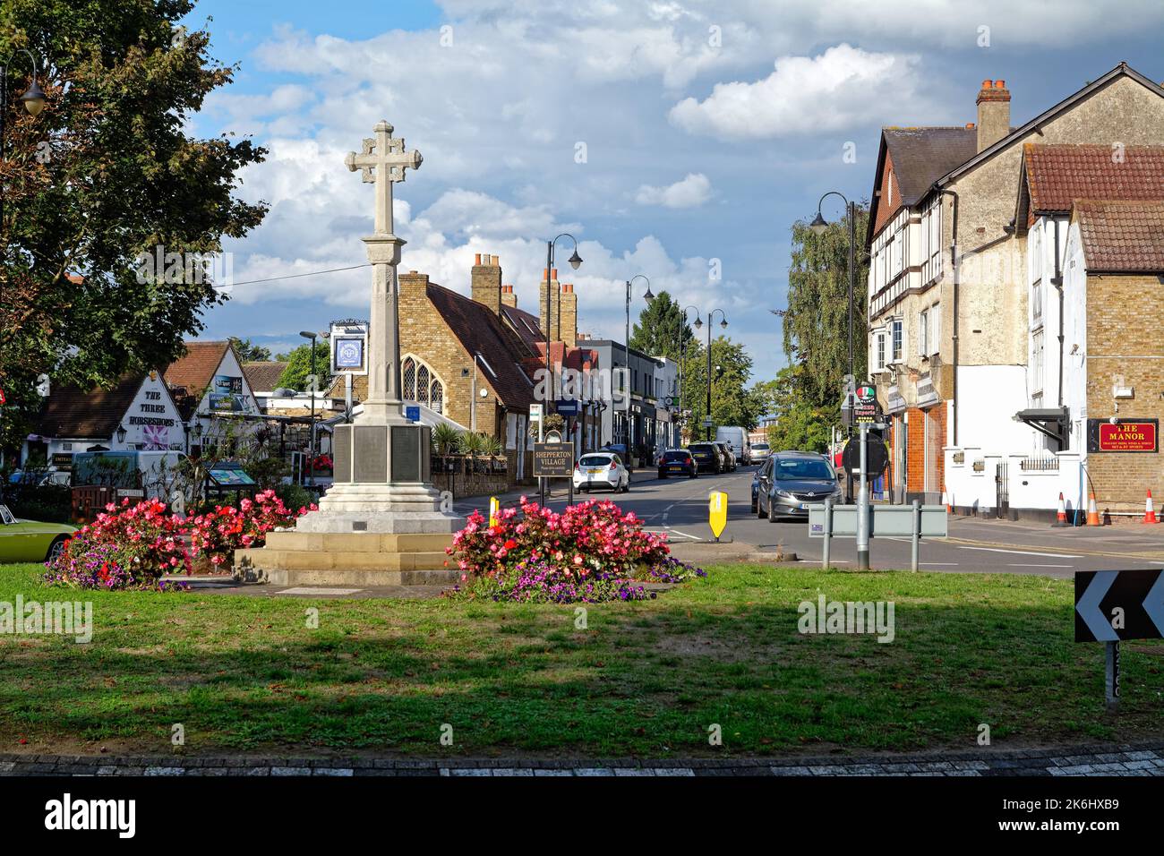 The War Memorial and the High Street at Shepperton on an sunny autumnal ...