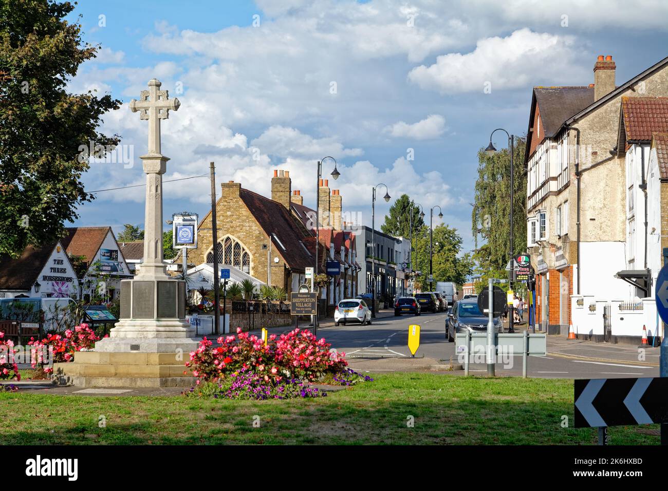 The War Memorial and the High Street at Shepperton on an sunny autumnal ...
