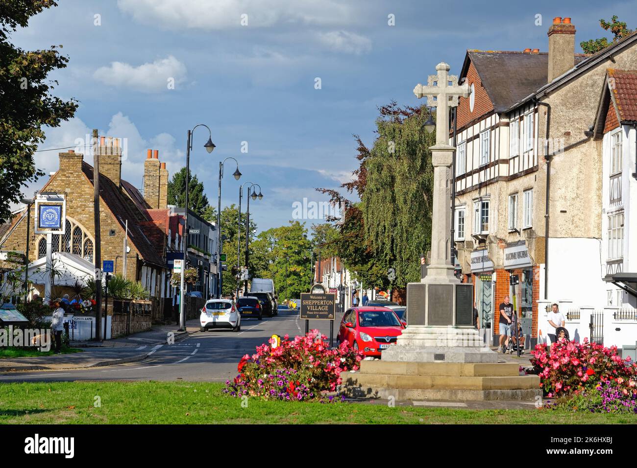 The War Memorial and the High Street at Shepperton on an sunny autumnal ...
