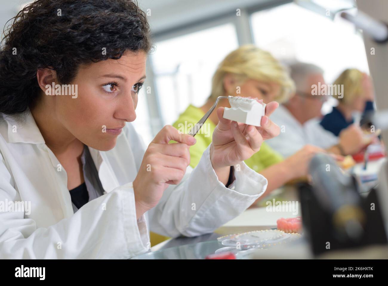 dental technician works on prosthesis Stock Photo - Alamy