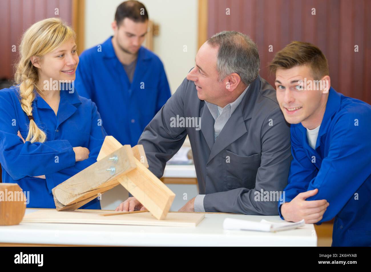 happy students in a wood workshop Stock Photo - Alamy