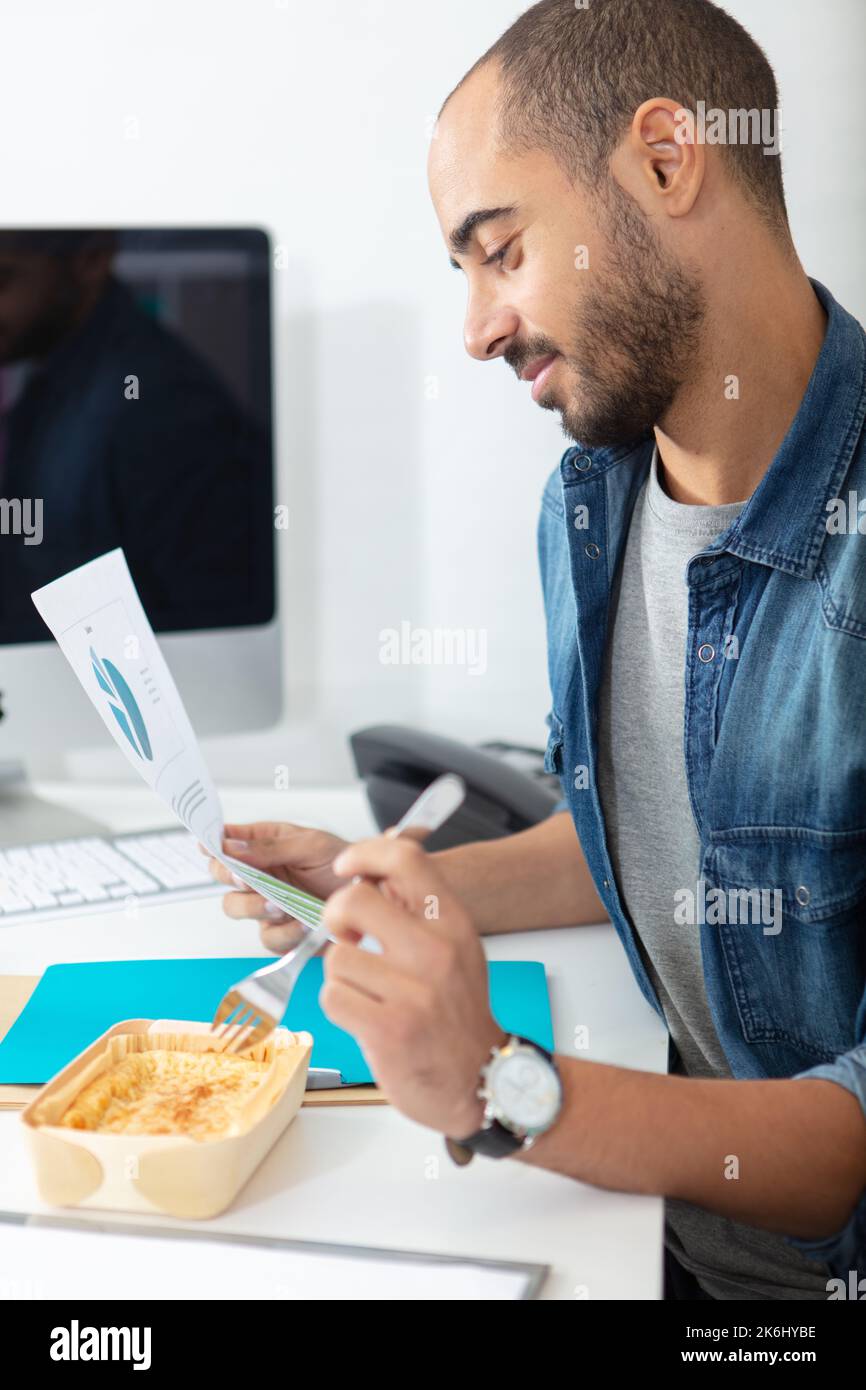 corporative worker having lunch break at the office Stock Photo - Alamy