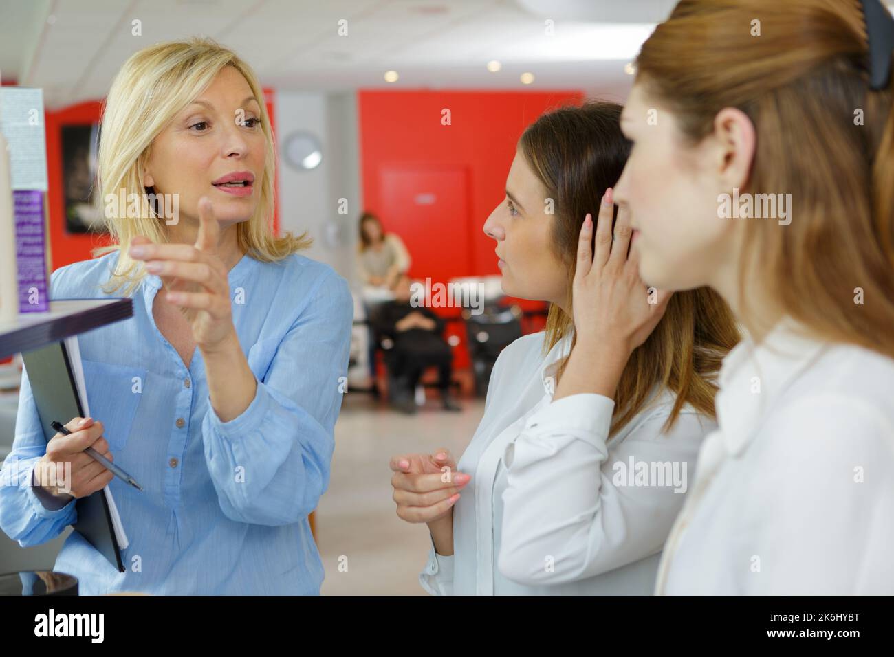 two colleagues dicussing work planing Stock Photo - Alamy