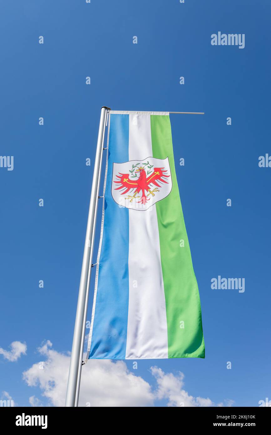 The Ladin flag with the tyrolean eagle Stock Photo - Alamy