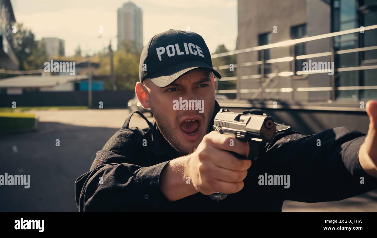 Police officer on duty holding arrest uniform hi-res stock photography ...