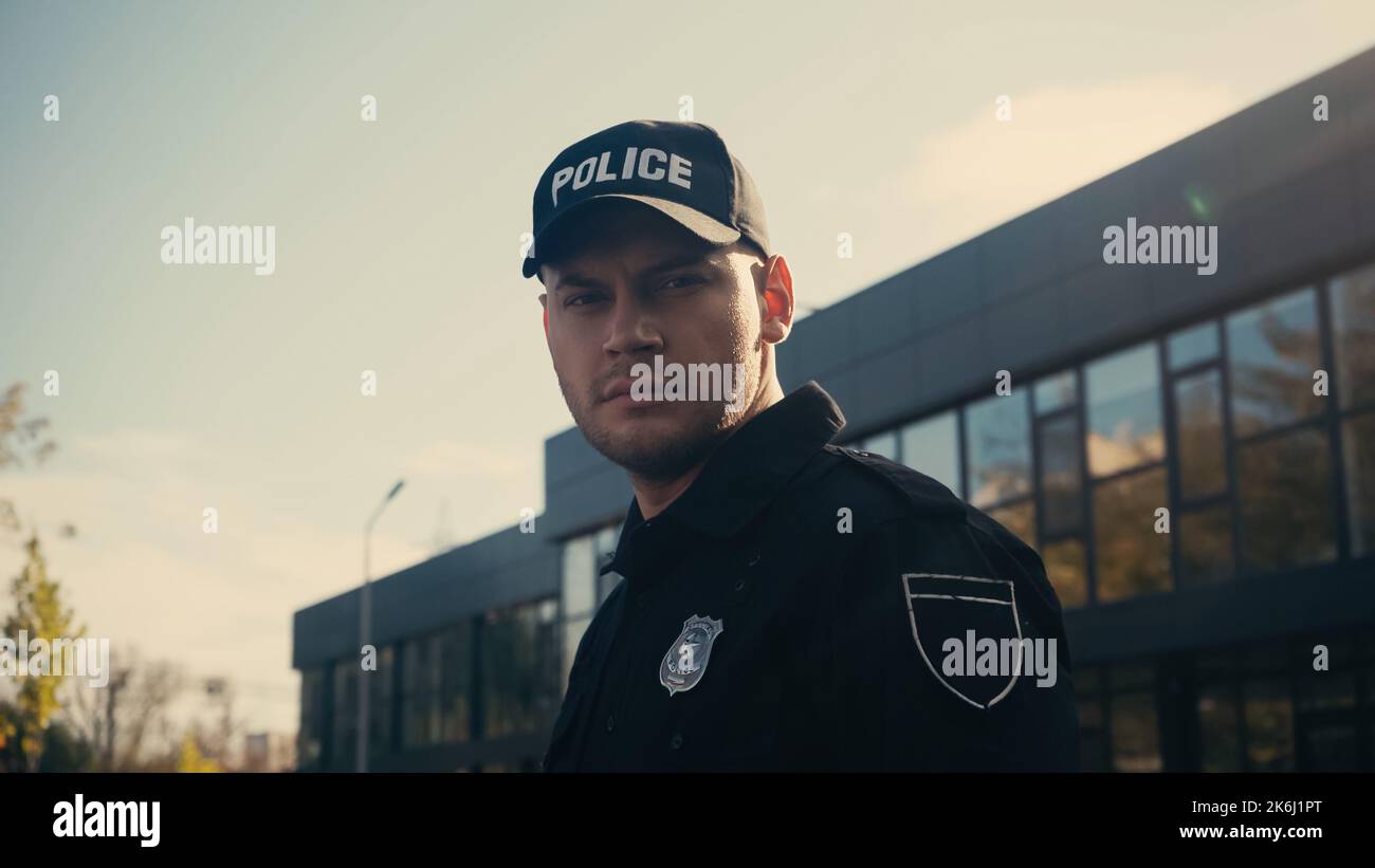 Handsome caucasian police officer standing hi-res stock photography and ...