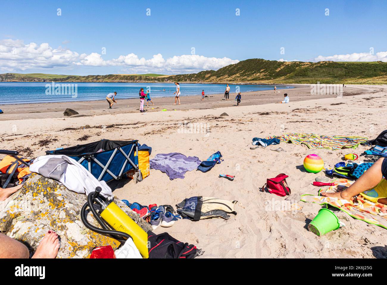 Families playing on the sandy beach at Ardwell Bay, Dumfries & Galloway ...