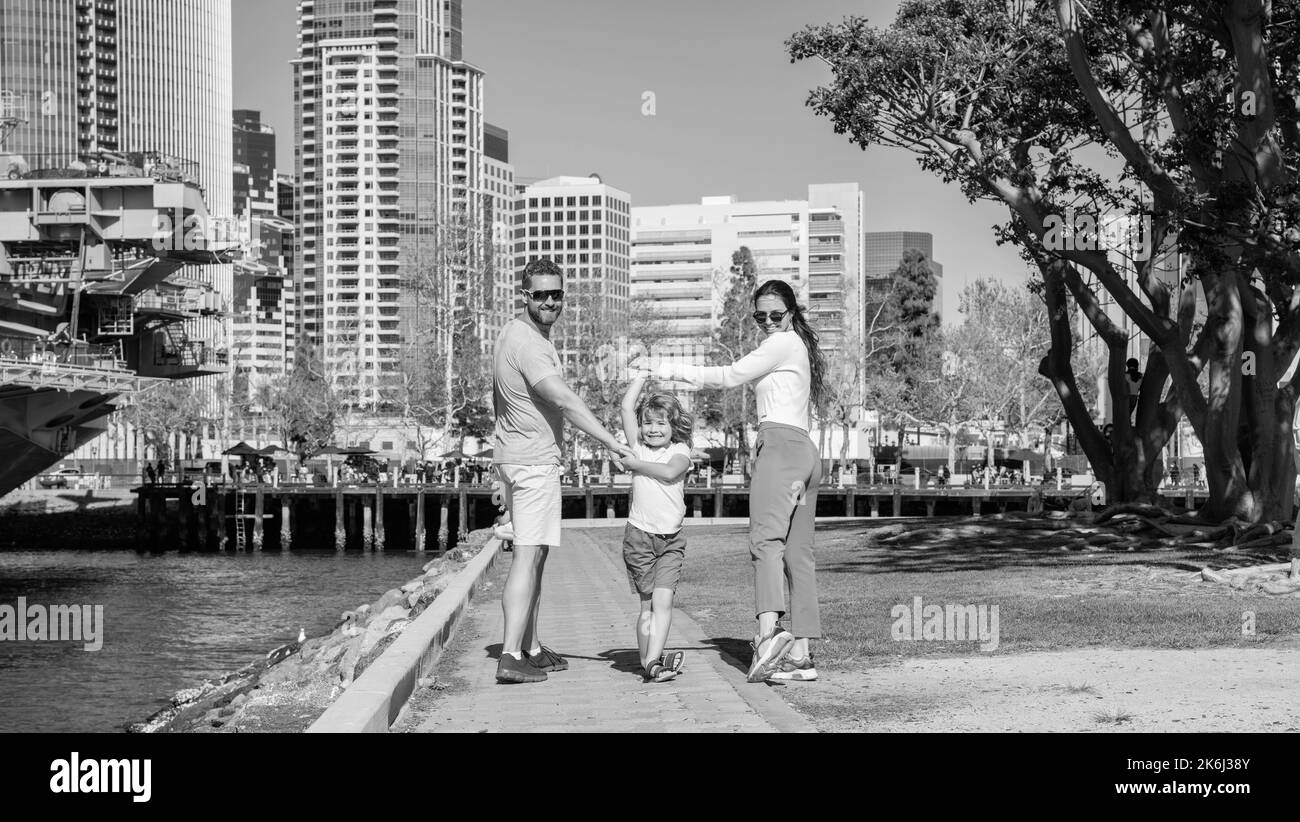 mom dad and son love relax together. adoption and charity. family day ...