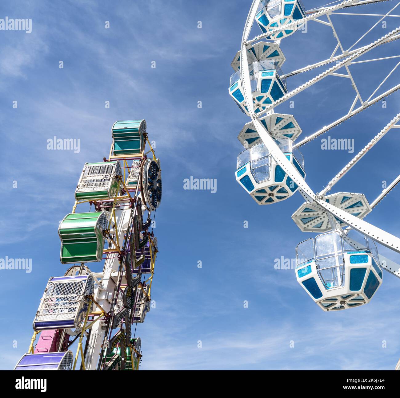 Carnival ferris wheel against a blue-sky background Stock Photo - Alamy