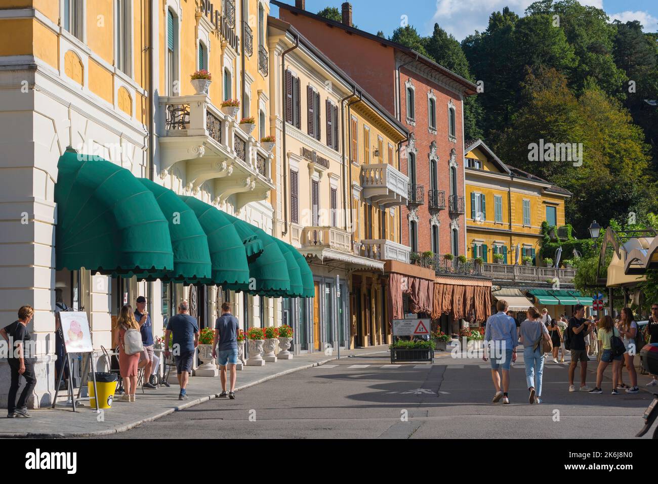 Bellagio street, view in summer of people walking beside colourful ...
