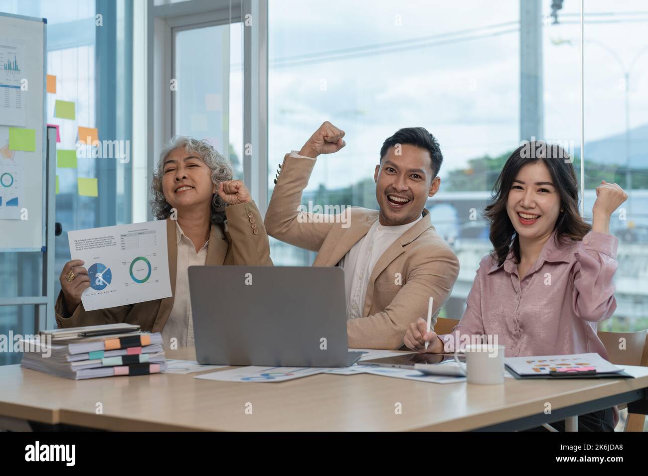 Team of successful business financial is celebrating the receiving of ...