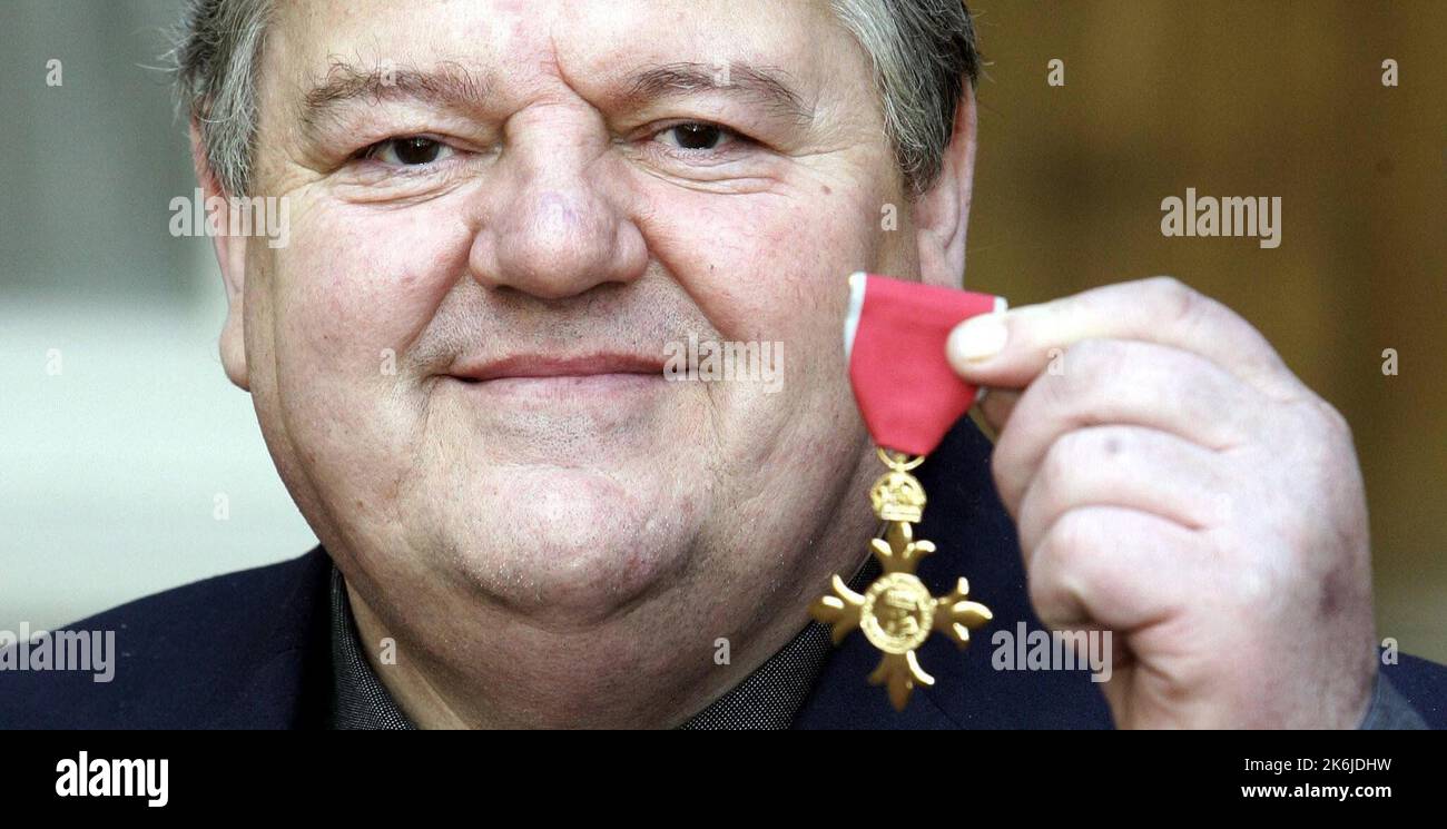 File photo dated 02/03/2006 of Robbie Coltrane with his OBE after ...