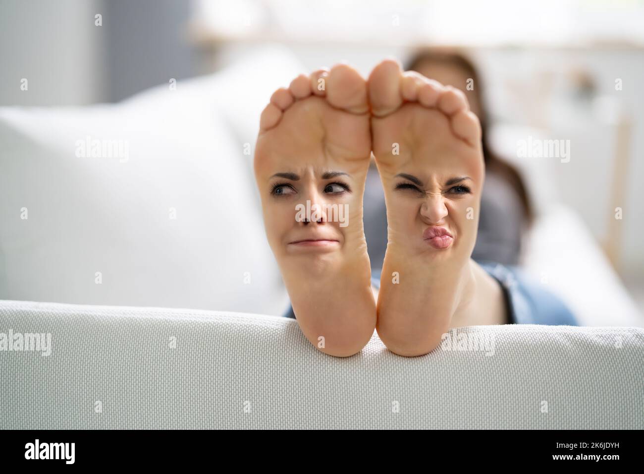 Feet Pain On Foot Smell. Funny Sad Face Stock Photo - Alamy