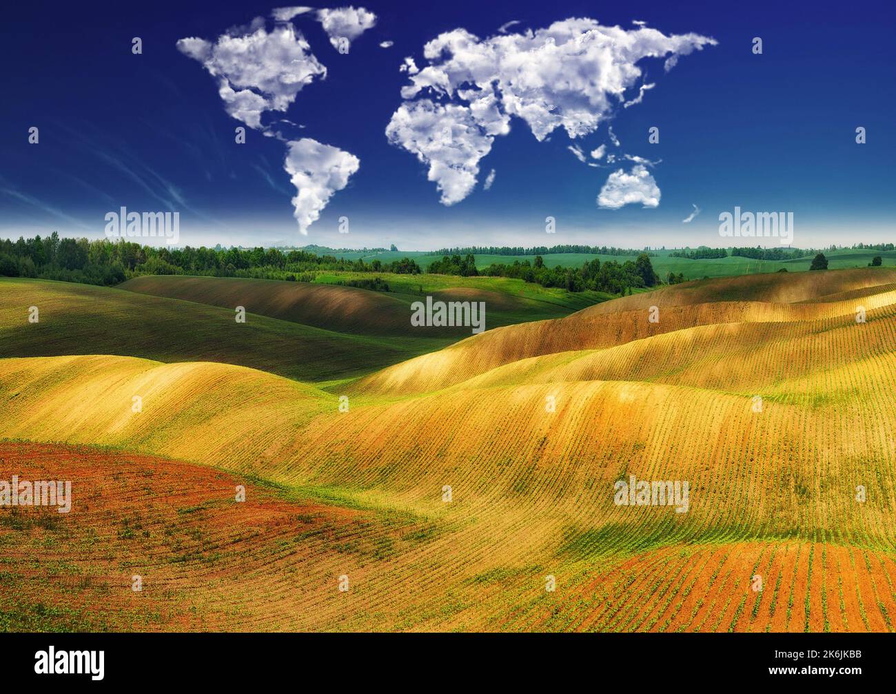 clouds in the form of a map of the world over the field. Travel and ...