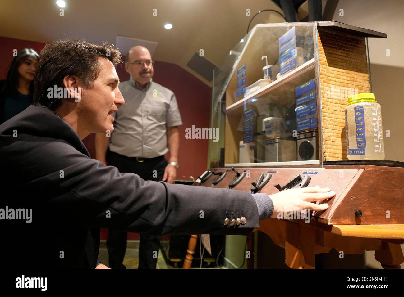 Canada. 14th Oct, 2022. Prime Minister Justin Trudeau looks at a model ...