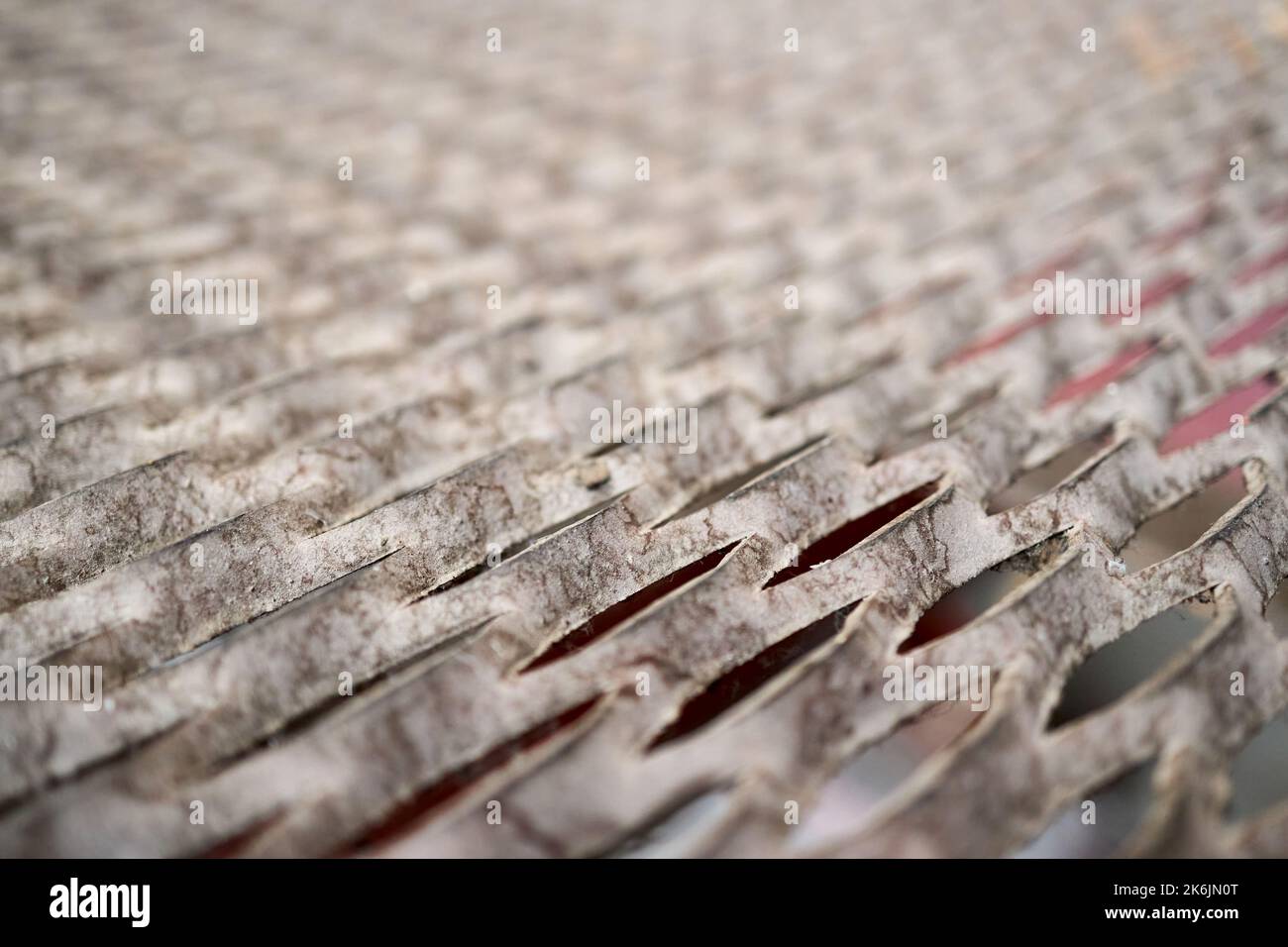 Perforated metal sheet stamping plates texture angled view. Made ...