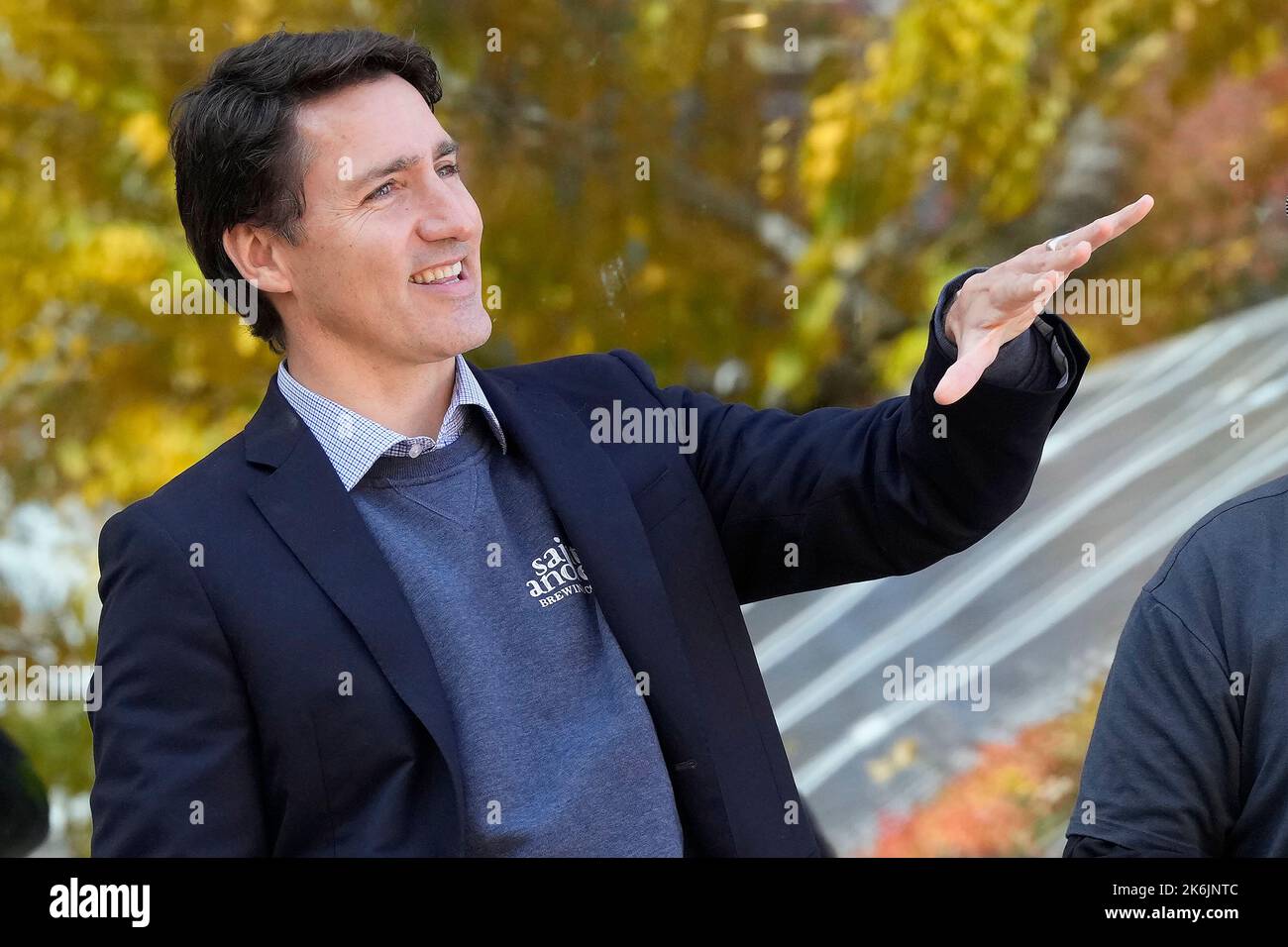 Canada. 14th Oct, 2022. Prime Minister Justin Trudeau looks at a solar ...