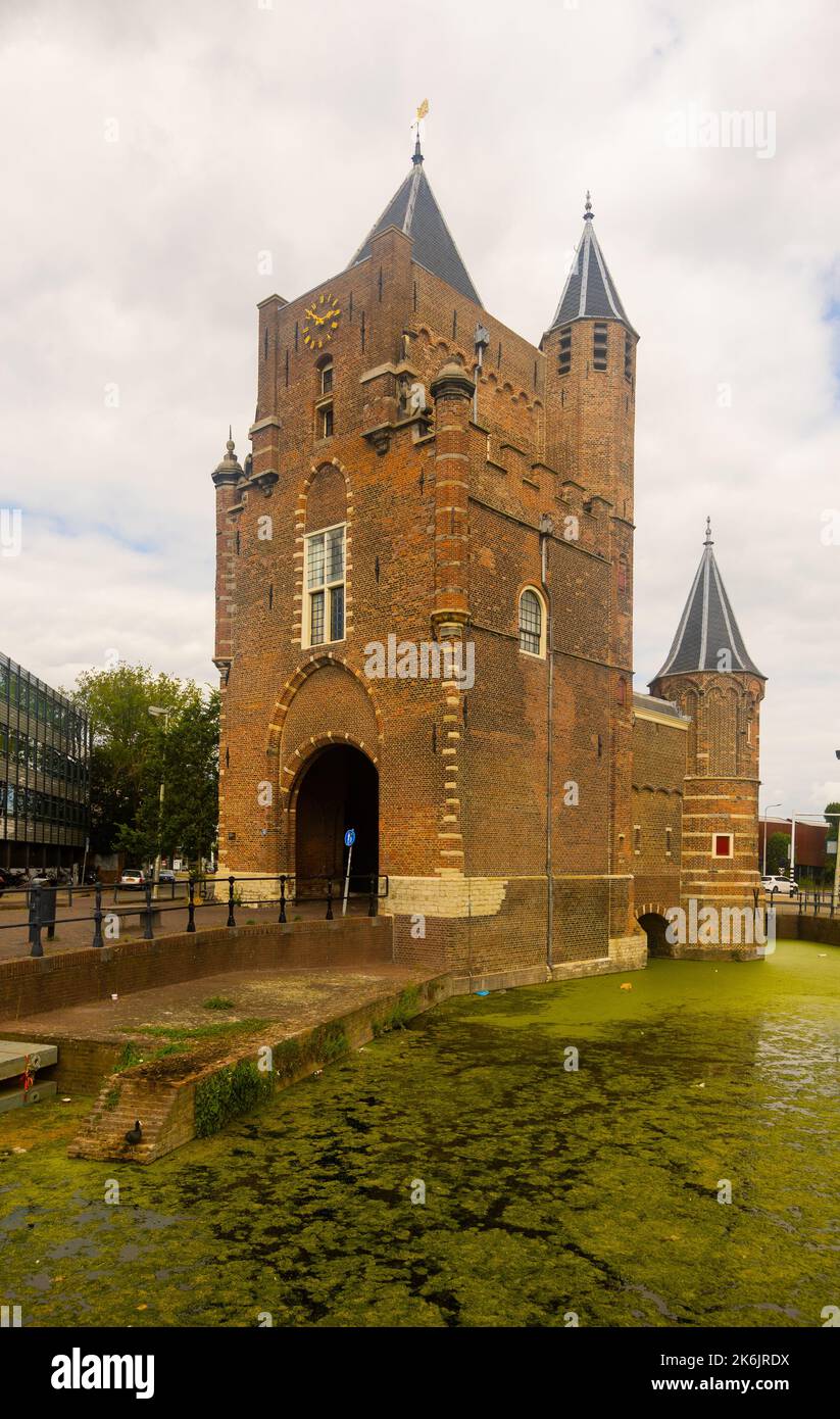 Summer landscape with a view of the Amsterdamse Poort in the of city ...