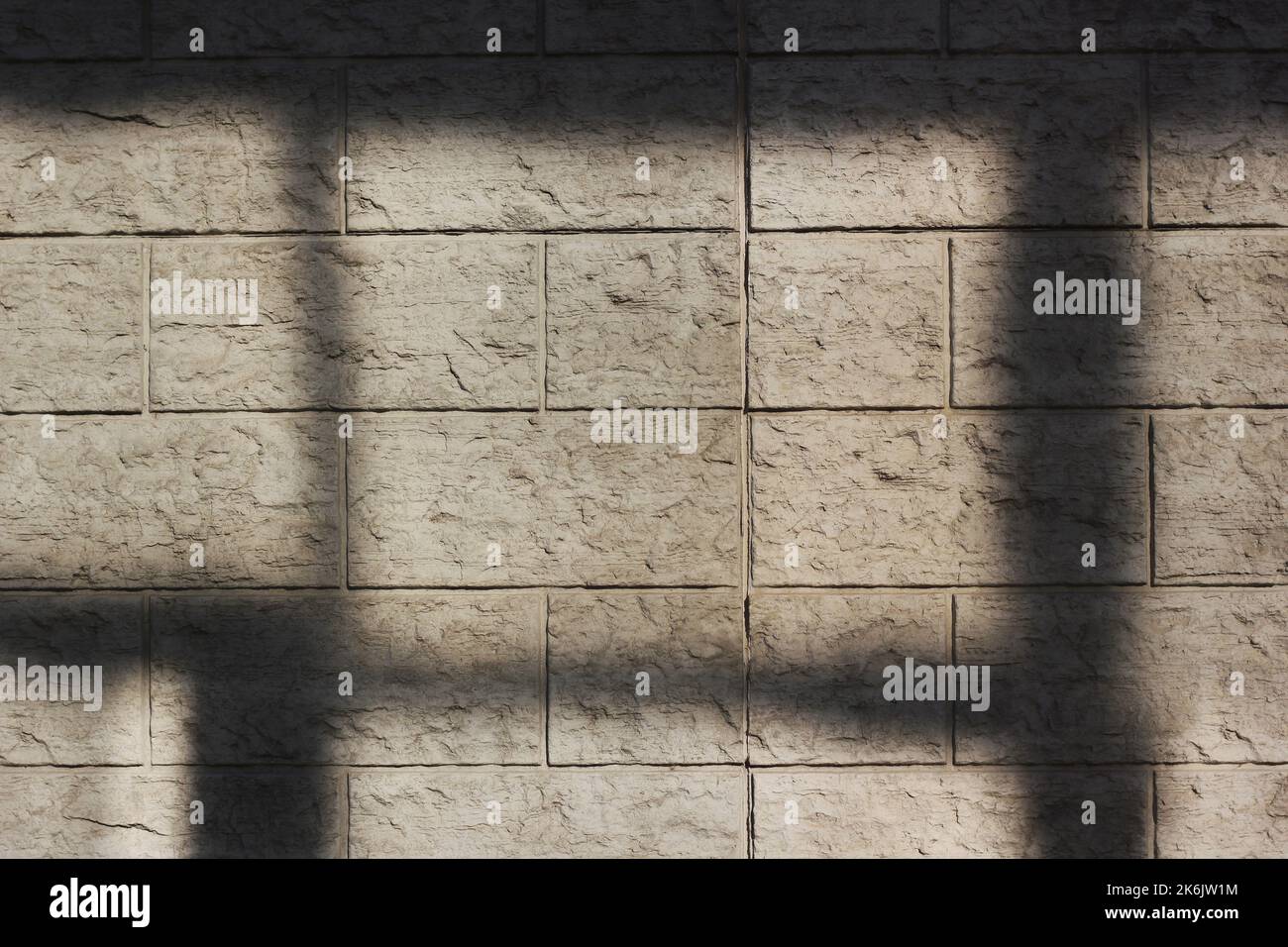 A typical common typical block natural stone wall with a shadow frame ...