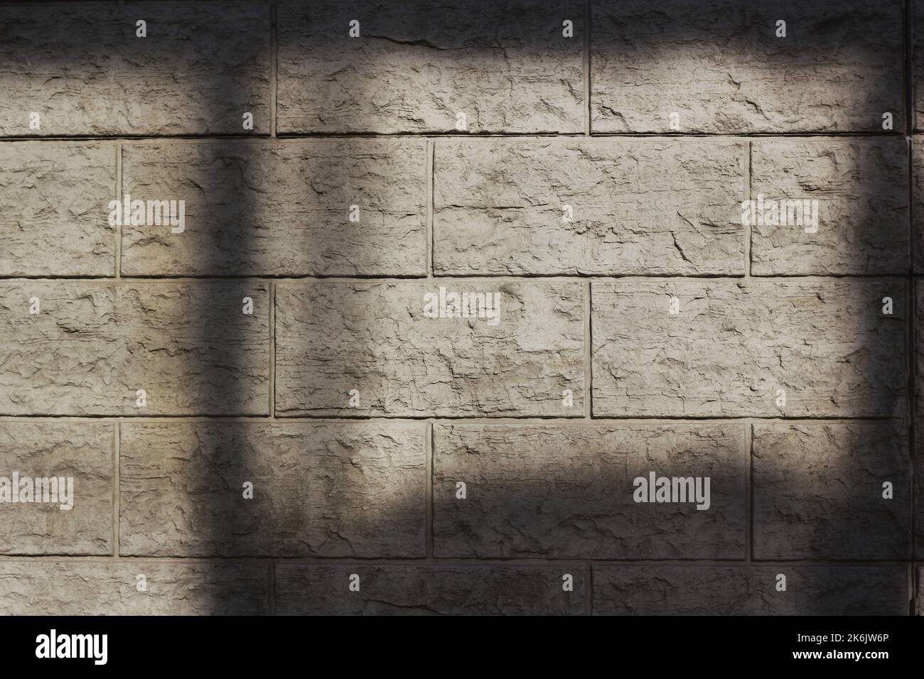 A typical common typical block natural stone wall with a shadow frame ...