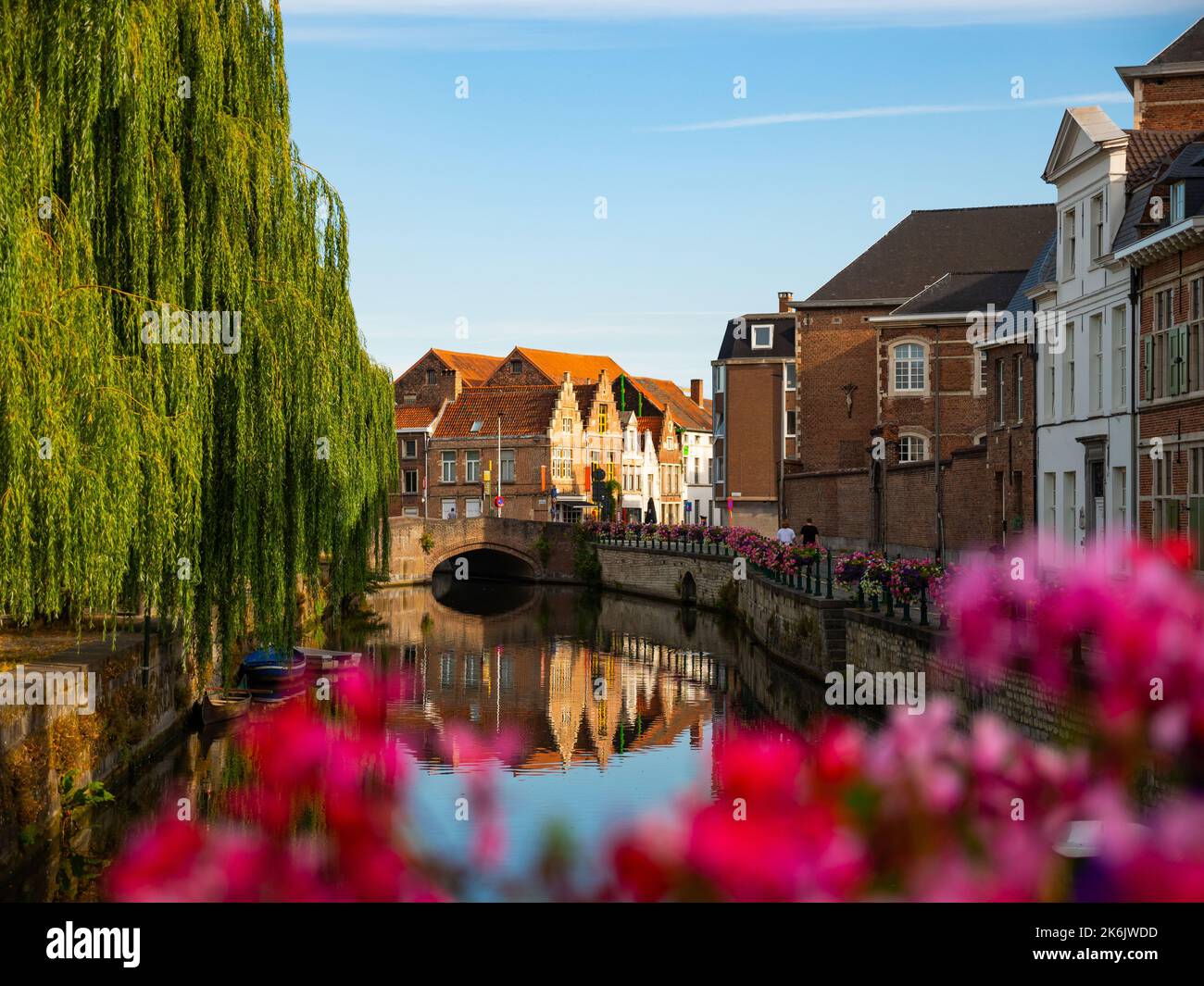 Cityscape of Ghent with traditional Flemish townhouses on banks of Leie ...