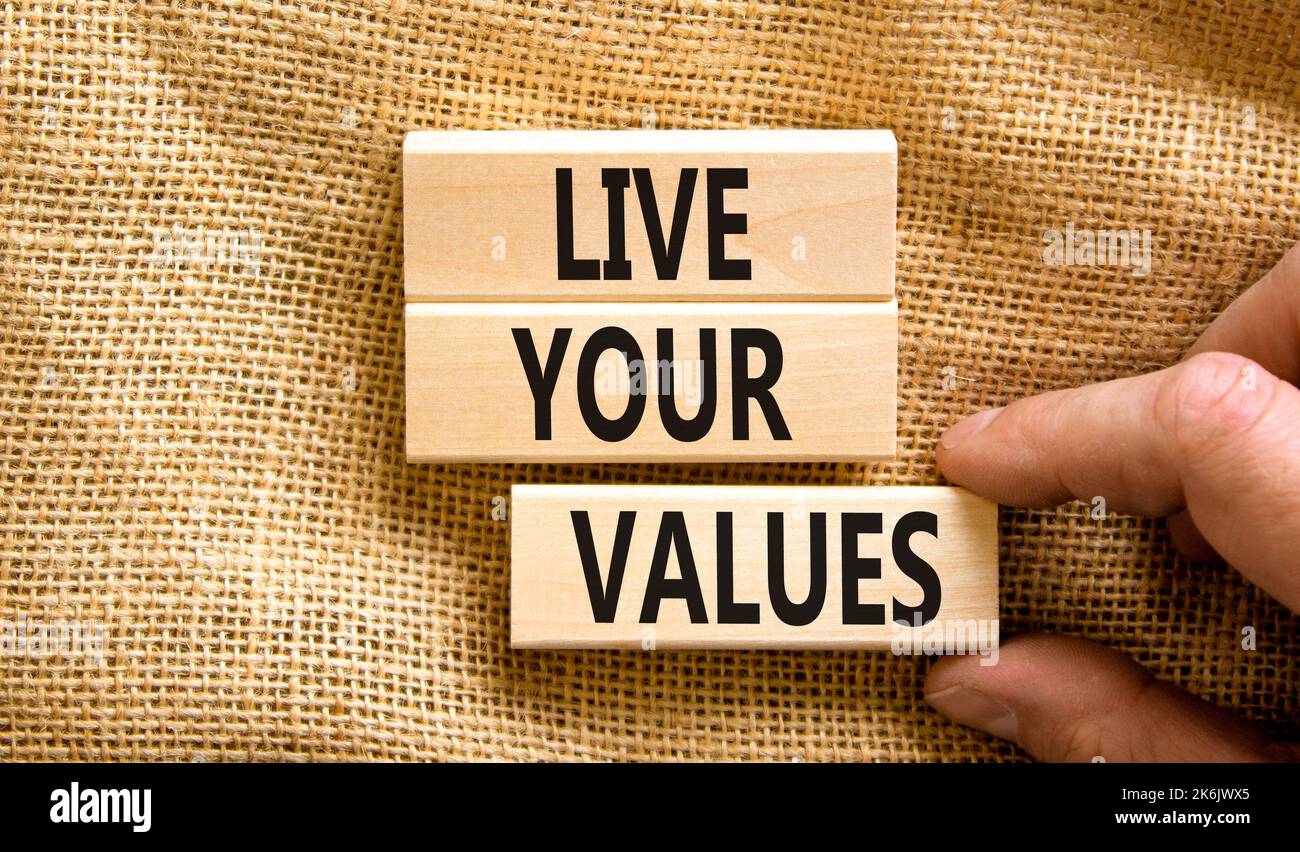 Live your values symbol. Concept words Live your values on wooden ...