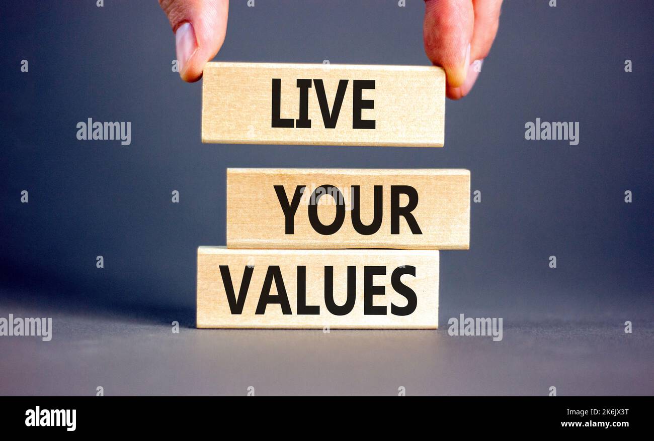 Live your values symbol. Concept words Live your values on wooden ...