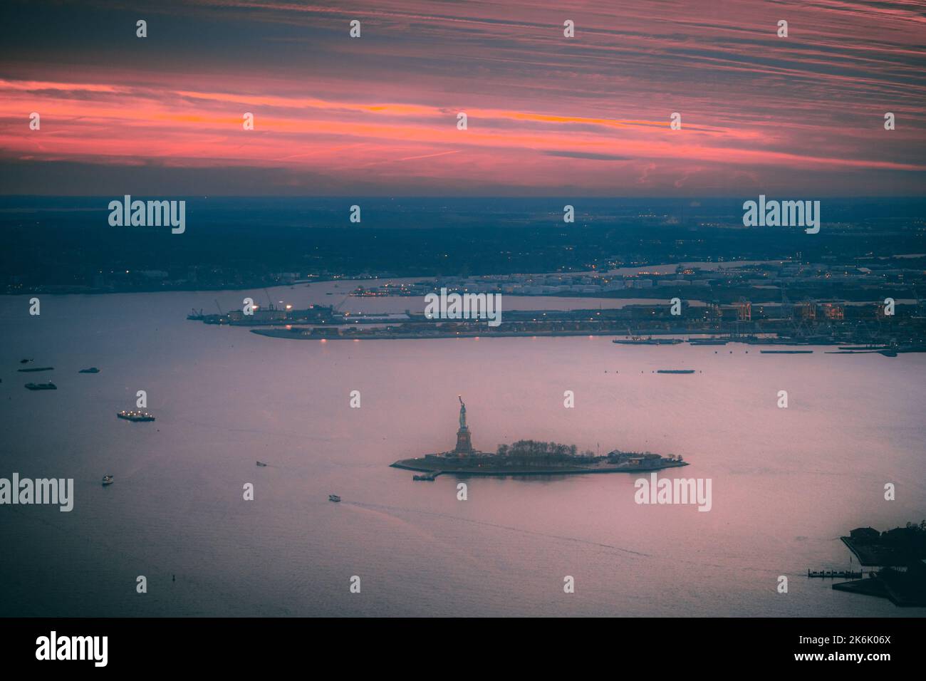 Sunset over Statue of Liberty Stock Photo - Alamy