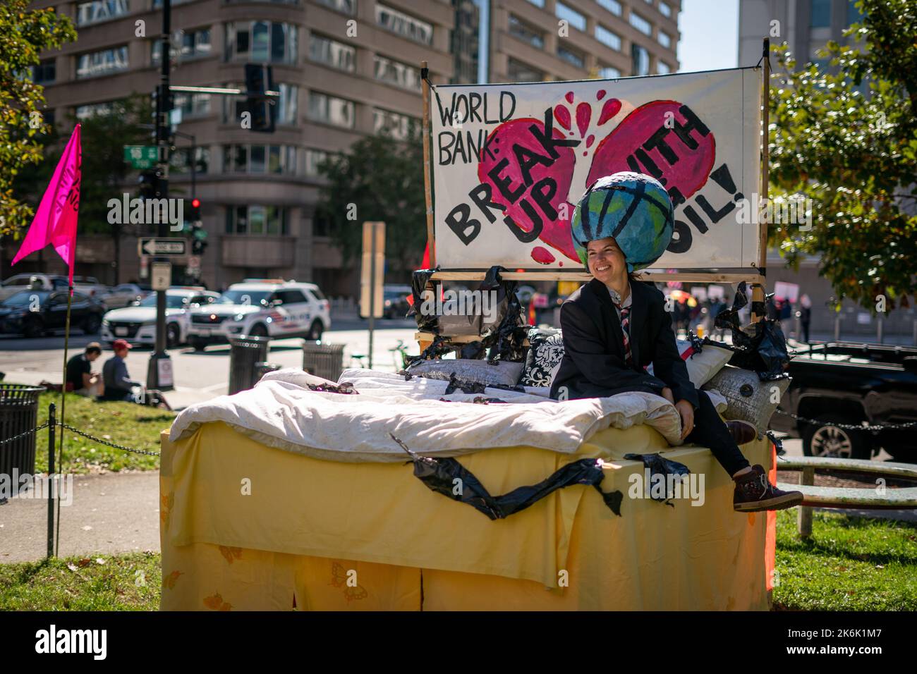 Washington, United States. 14th Oct, 2022. A protester smiles while ...