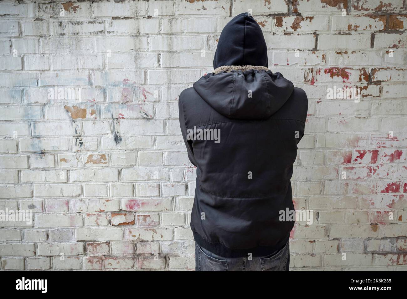 A drug addict in the hood, experiencing a drug addiction crisis ...