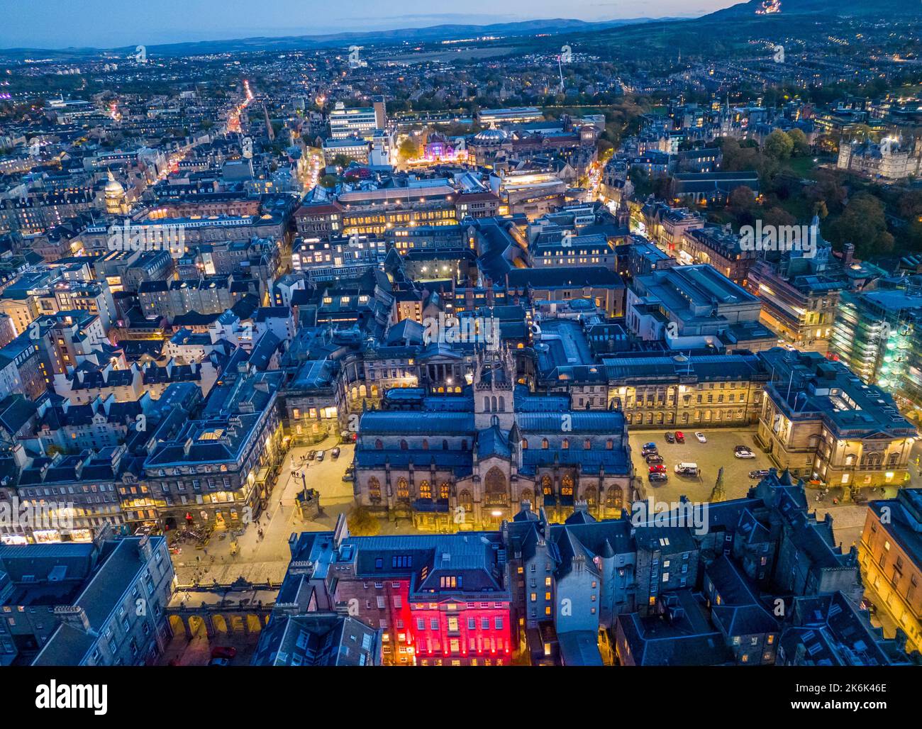 Aerial view at dusk of skyline of Edinburgh Old Town and St Giles ...