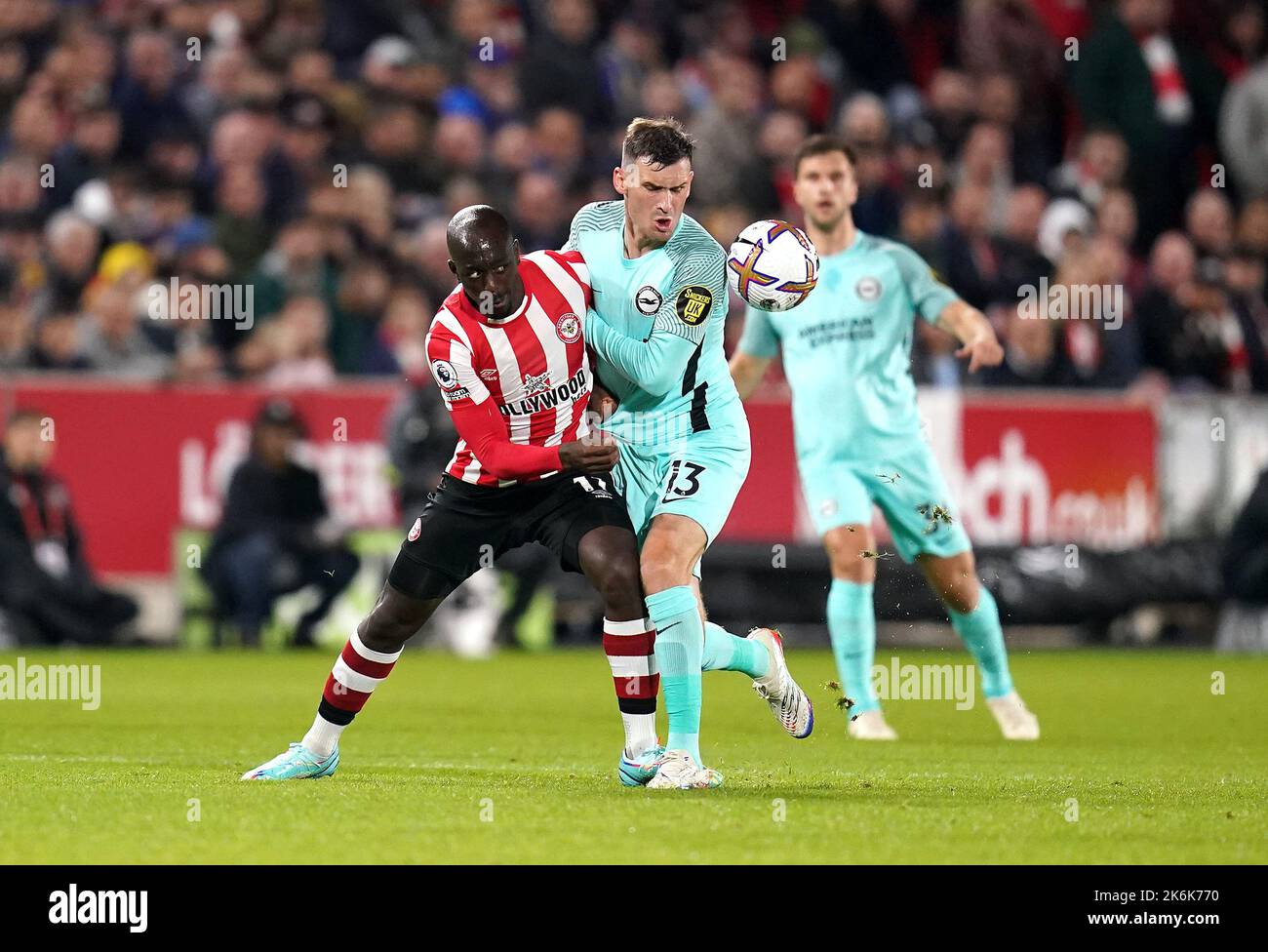 Brentford's Bryan Mbeumo (left) and Brighton and Hove Albion's Pascal ...