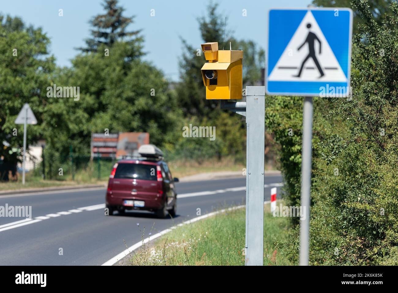 speed camera and pedestrian crossing road sign Stock Photo - Alamy