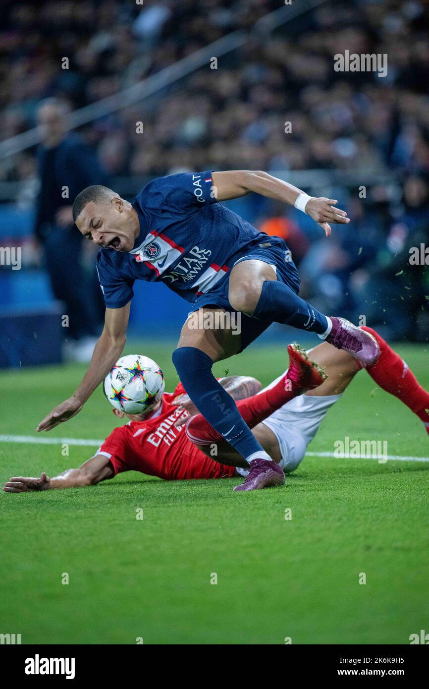 PARIS, FRANCE - OCTOBER 11: Gilberto of SL Benfica tackle Kylian Mbappe of Paris Saint-Germain ...