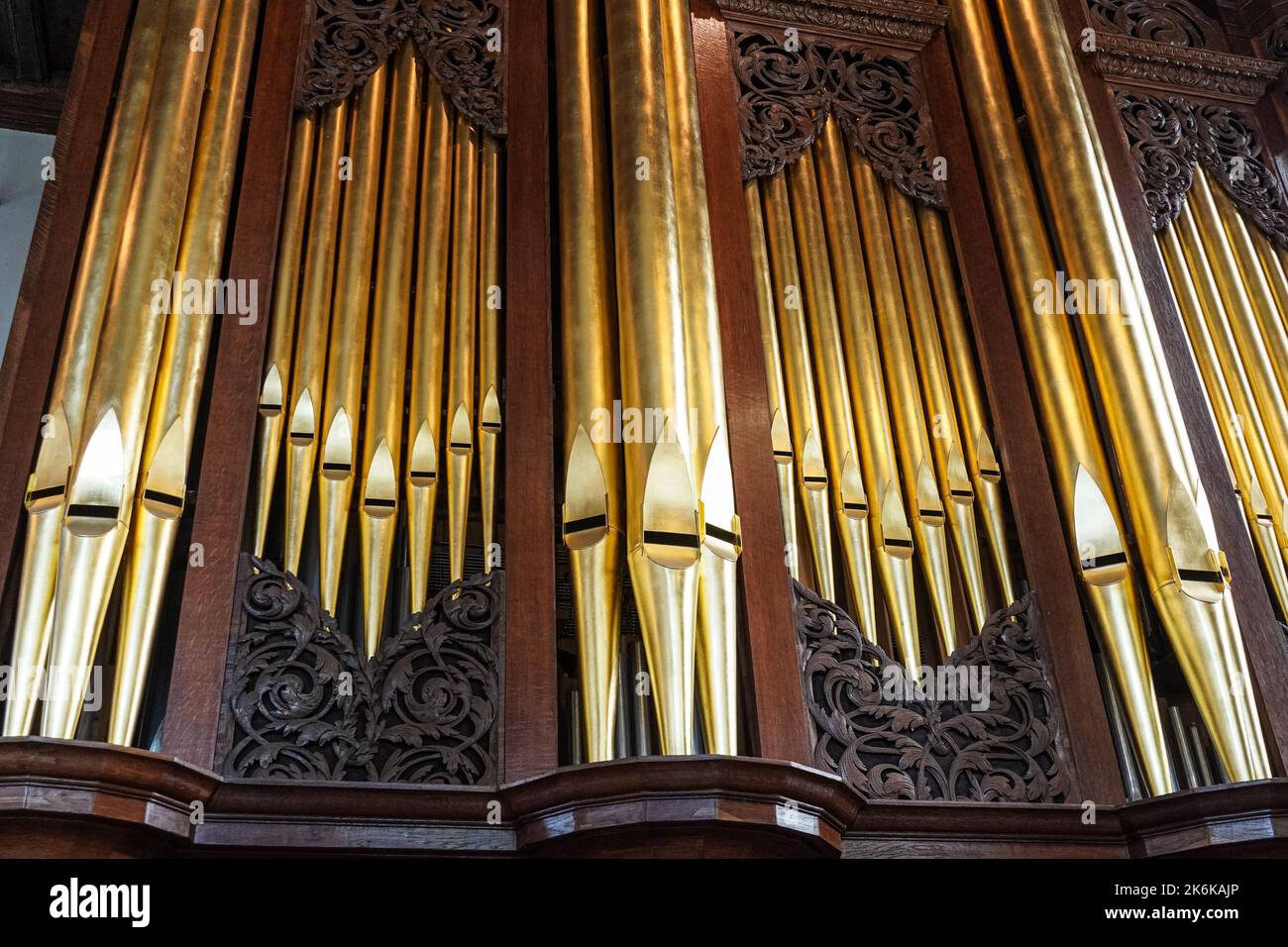 Pipes of the pipe organ inside the chapel Stock Photo - Alamy
