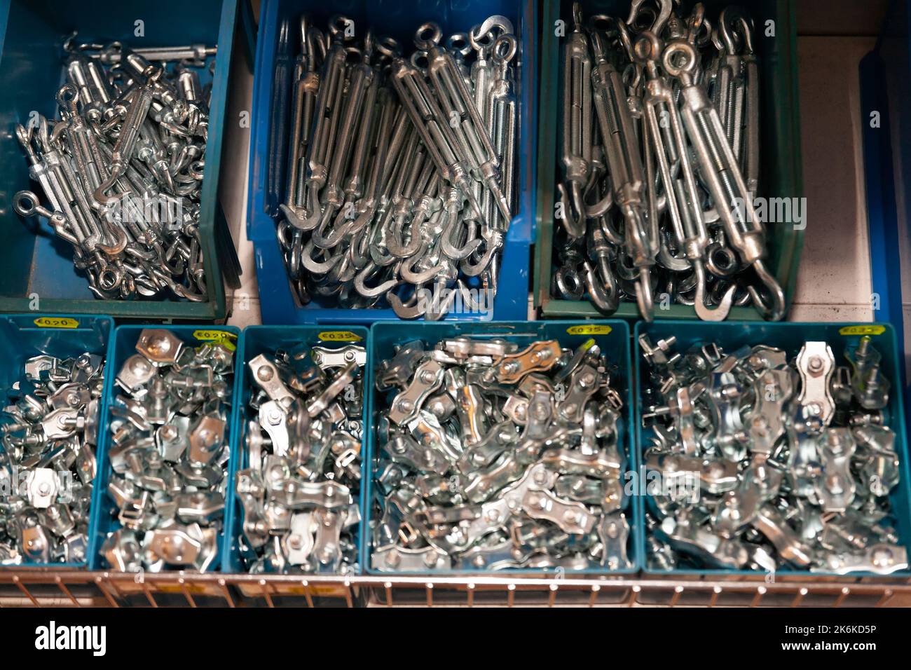 Boxes with building hardware in a hardware store Stock Photo - Alamy