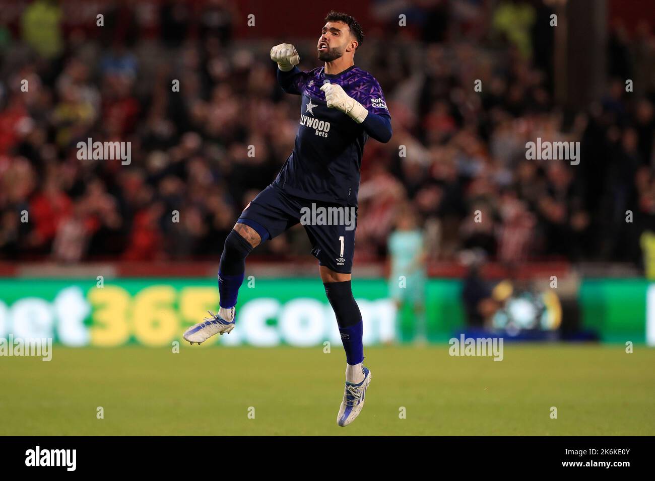 GOAL: David Raya #1 of Brentford celebrates the opening goal during the ...