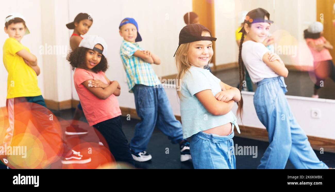 Kids training hip hop in dance studio Stock Photo - Alamy