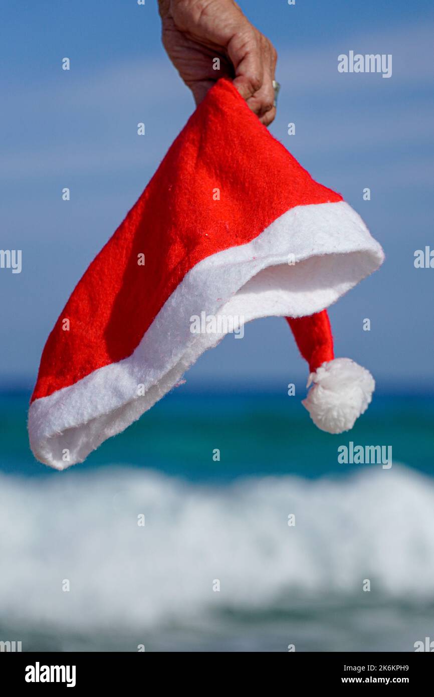 christmas at sea. Santa claus hat with ocean background Stock Photo - Alamy