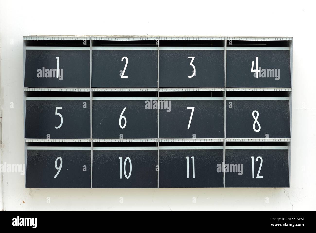 industrial background of letter boxes numbered from 1 to 12 Stock Photo ...