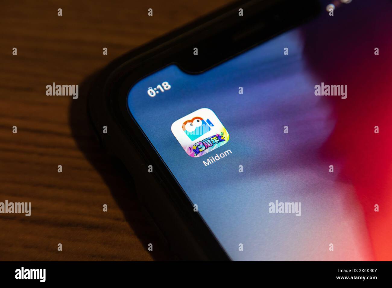Vancouver, CANADA - Oct 11 2022 : Mildom app (by DouYu Japan) on an iPhone. Mildom is a Japanese ...