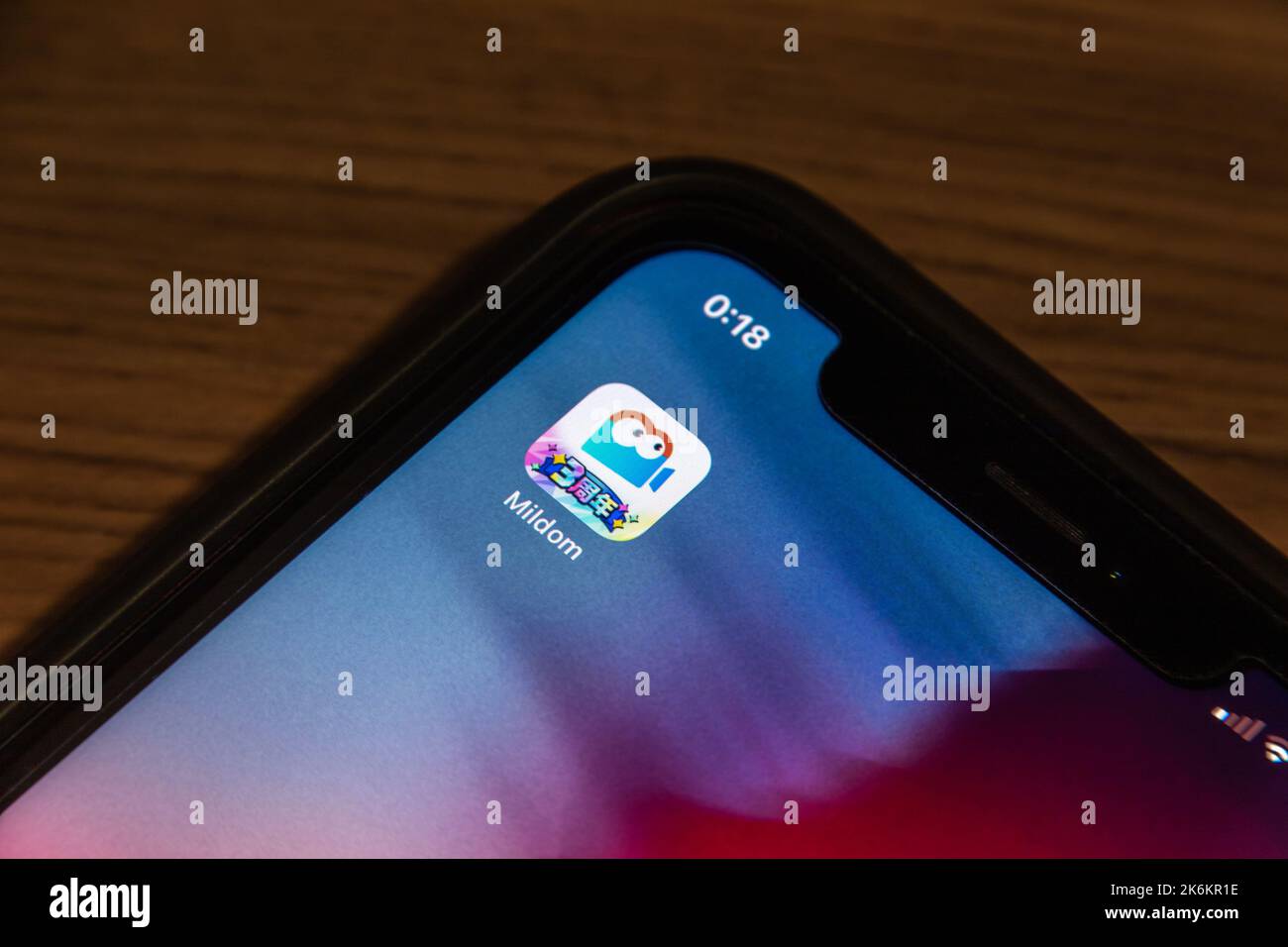 Vancouver, CANADA - Oct 11 2022 : Mildom app (by DouYu Japan) on an iPhone. Mildom is a Japanese ...