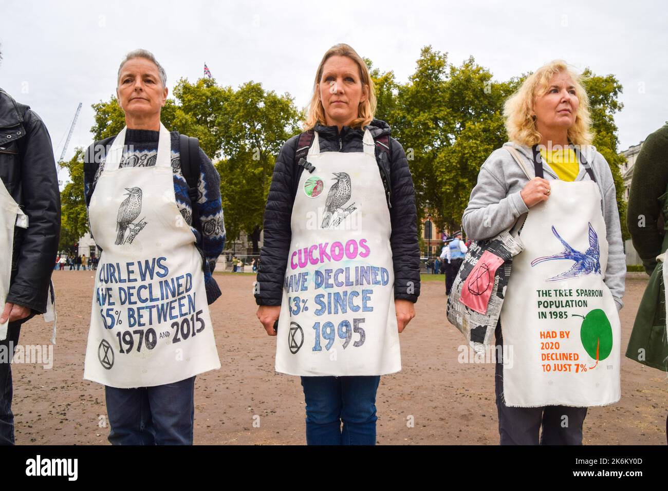 London, UK. 14th Oct, 2022. Protesters highlight the large declines of ...