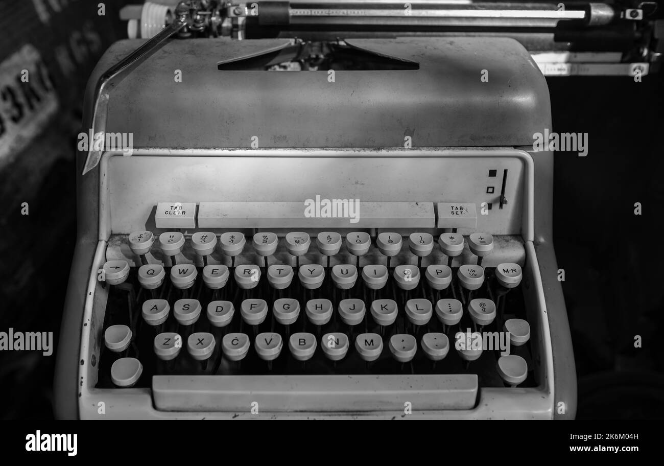 View of an antique manual Underwood typewriter. Close-up of a white and ...