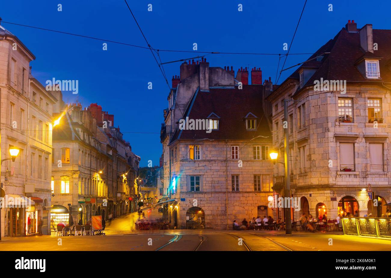 Evening view of illuminated lively historic center of Besancon, France ...