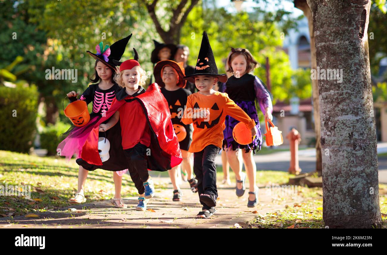 Child in Halloween costume. Mixed race Asian and Caucasian kids and ...