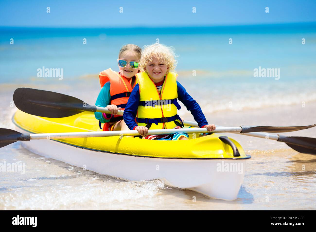 Child in canoe asia hi-res stock photography and images - Alamy